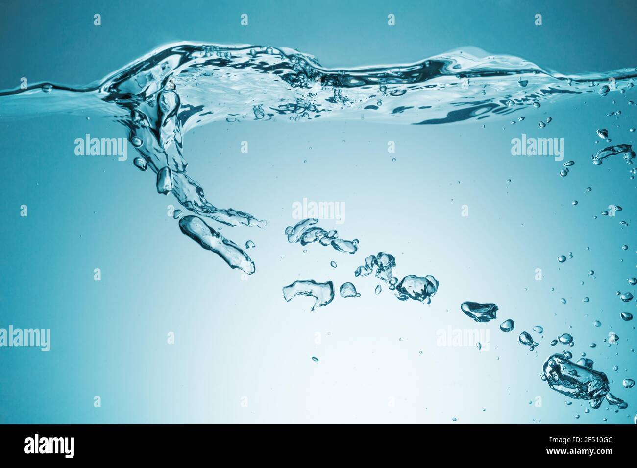 Water splash on surface with ripple and bubble Stock Photo - Alamy