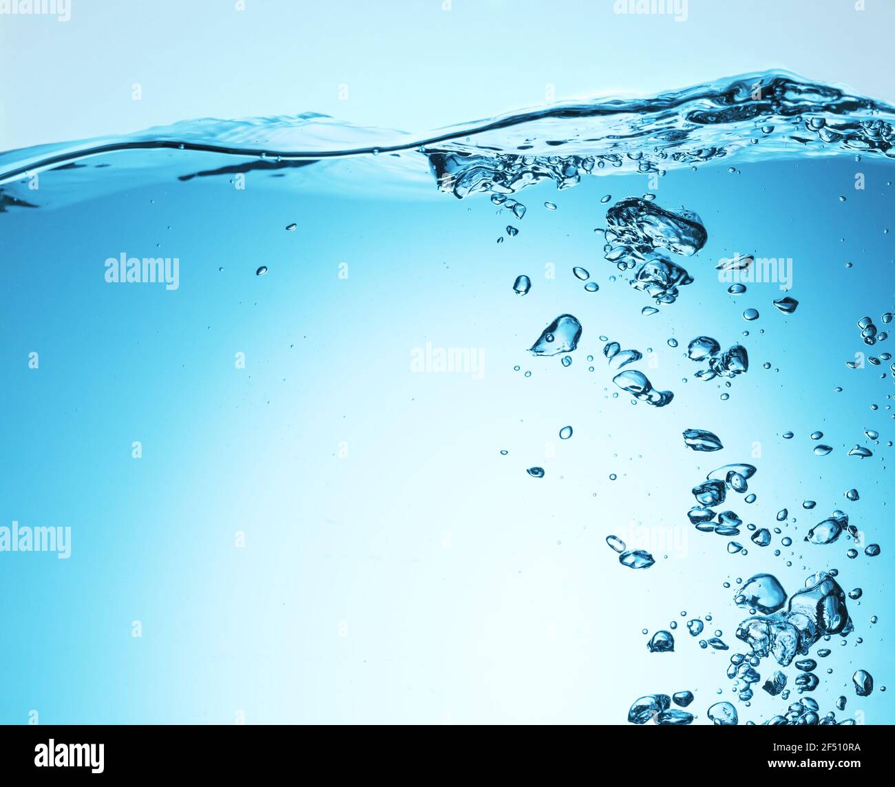 Water splash on surface with ripple and bubble Stock Photo - Alamy