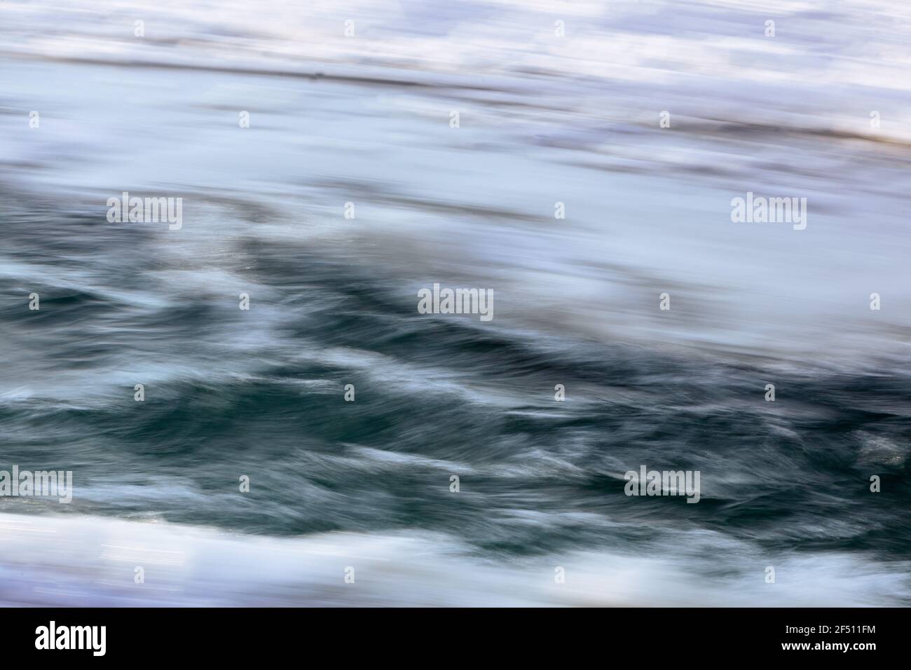 ice flow and water, intentional movement,, slow shutter speed, abstract ...
