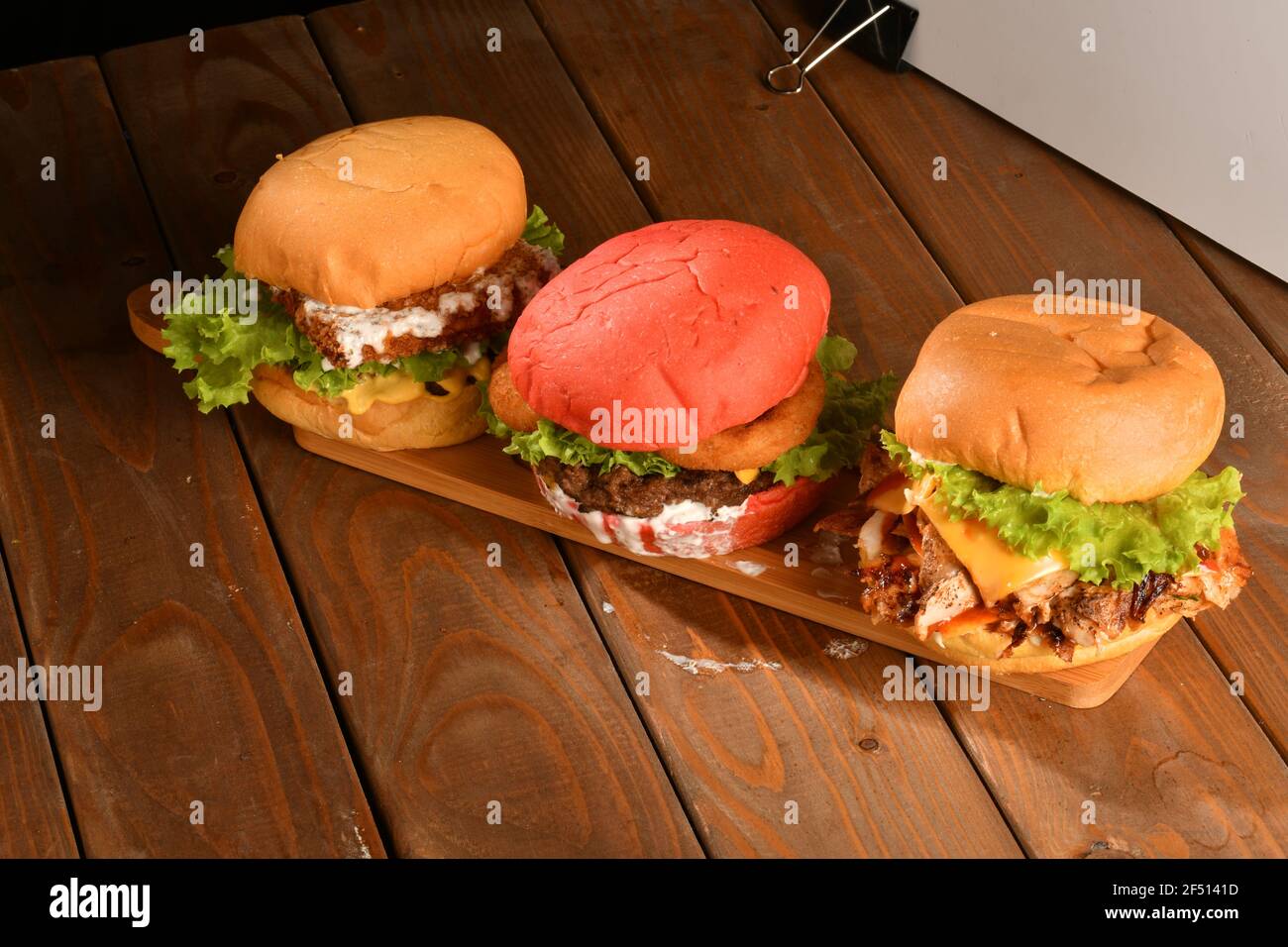 A hamburger (also burger for short) is a sandwich consisting of one or ...