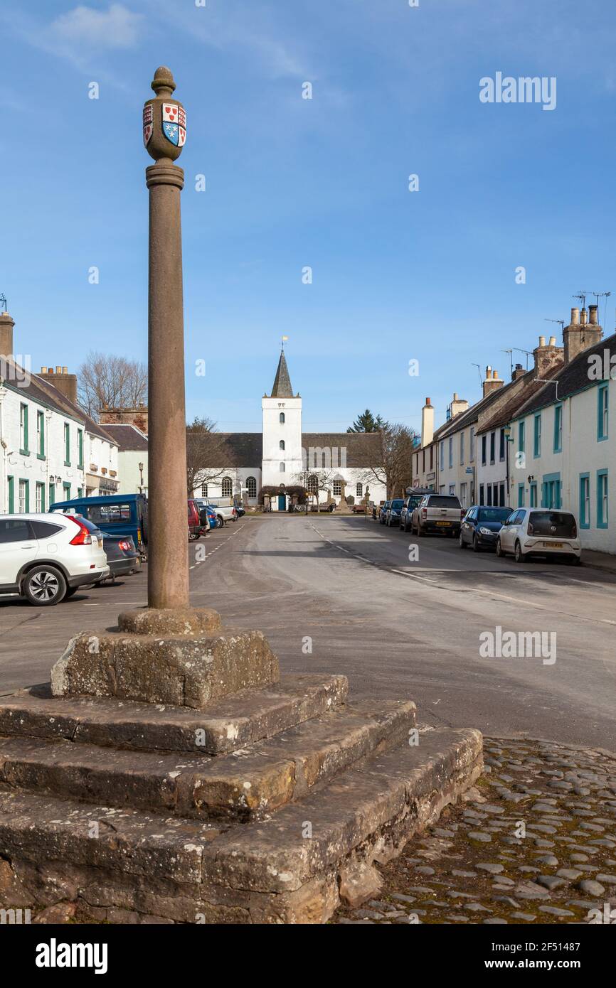 The mercat cross with Yester Parish Church in the background, Gifford ...