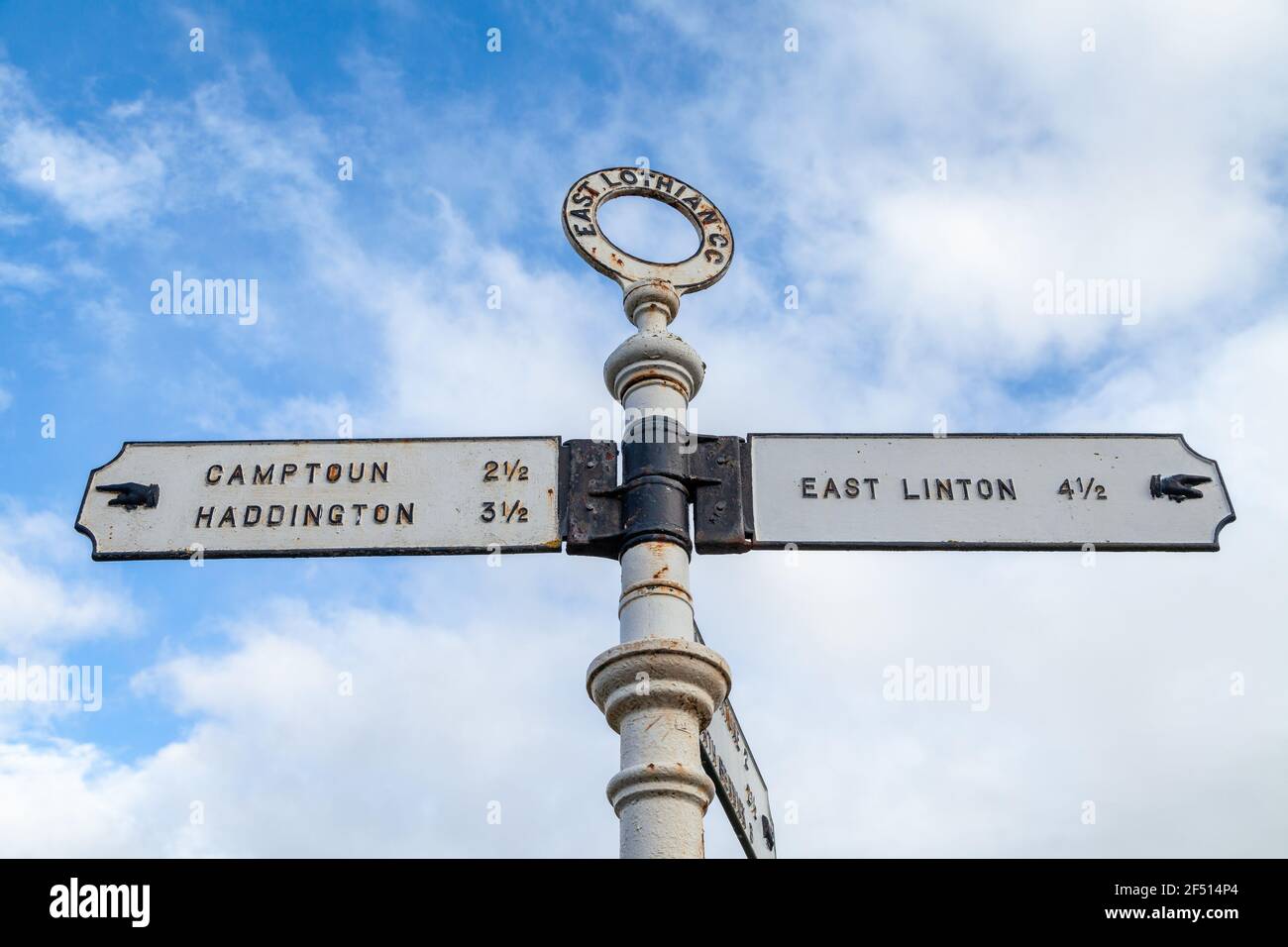 An old metal road sign post in Athelstaneford pointing towards Camptoun ...