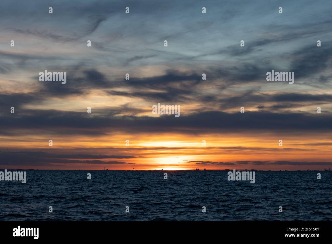 Dramatic sunset sky over the sea Stock Photo - Alamy