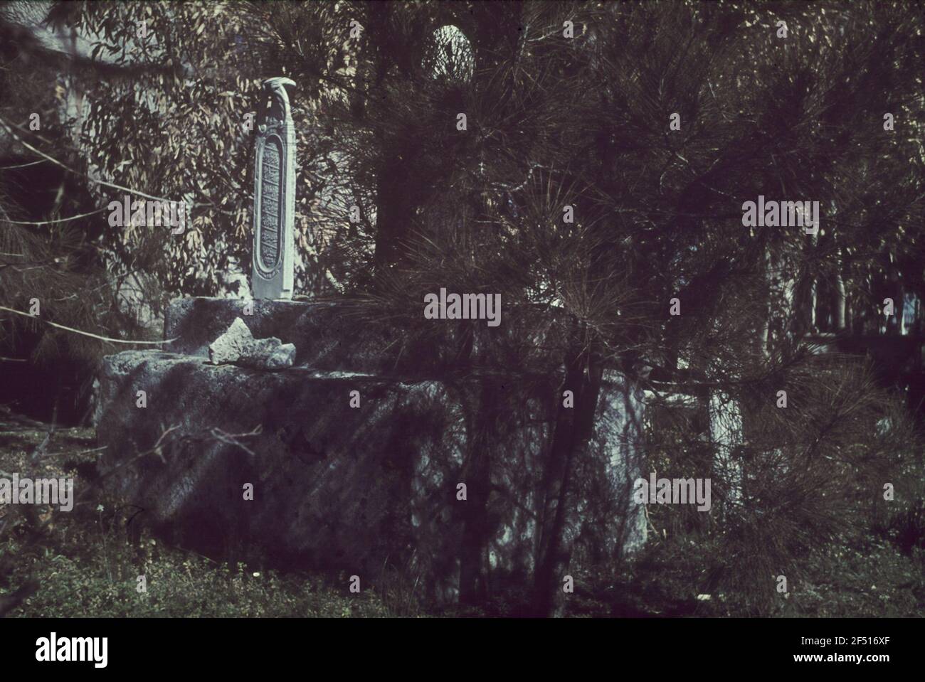 Travel photos. Stone stele, well with Arabic characters Stock Photo - Alamy
