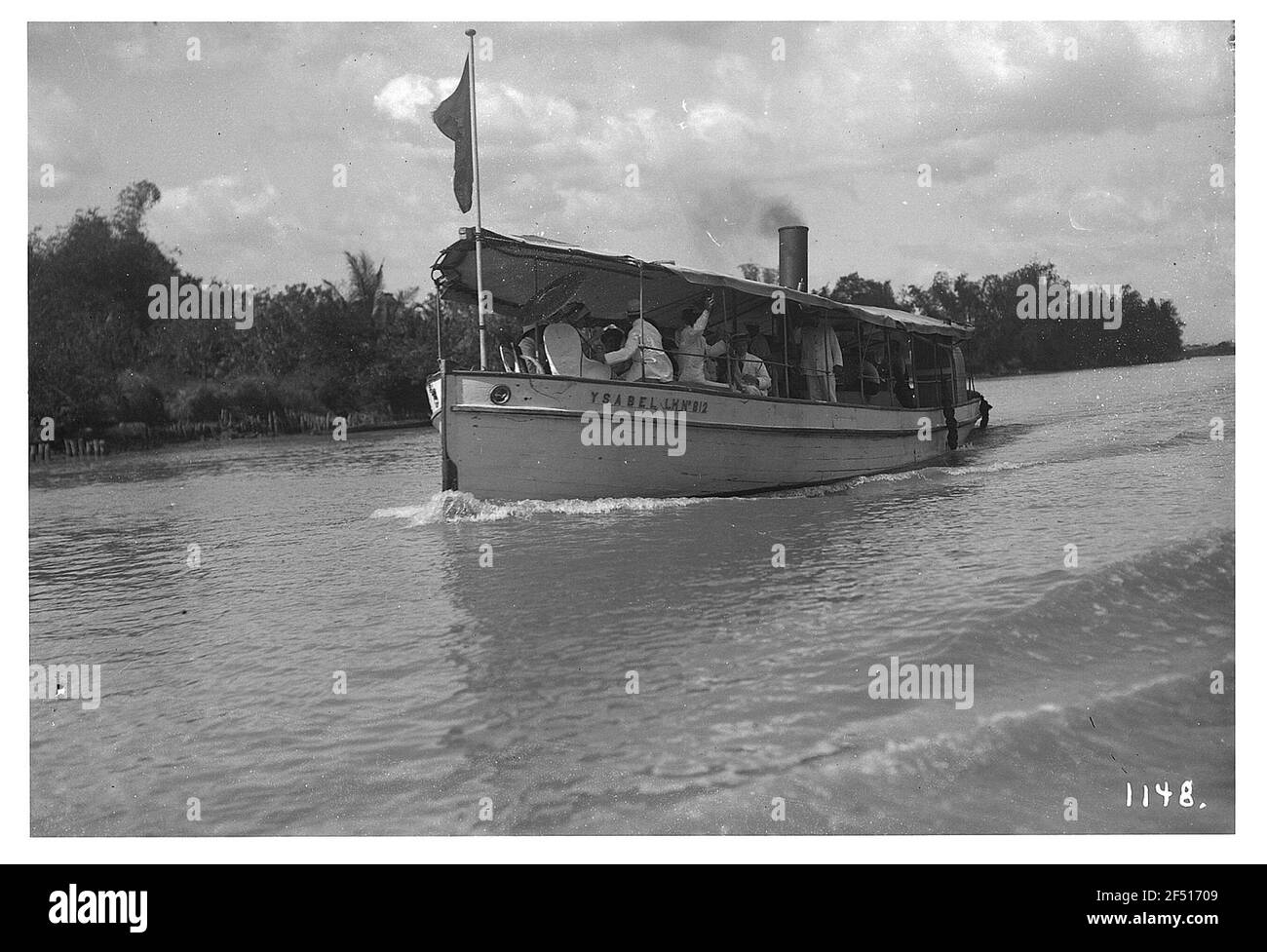 Manila (?) (Philippines). Passenger steamer "Ysabel" LHN 812 on a river ...