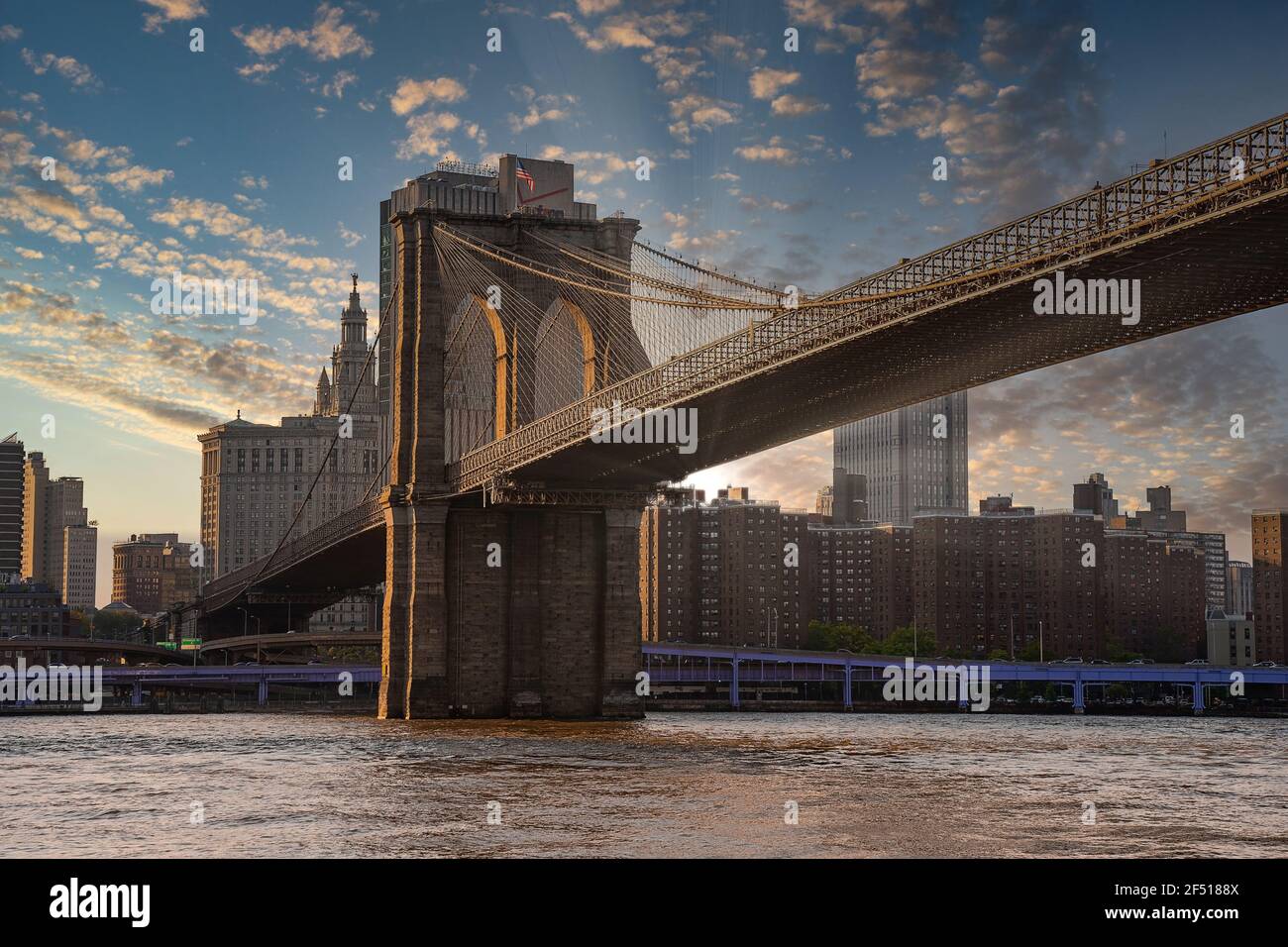 Magical sunset view of the Brooklyn Bridge. Empty bridge with no people ...