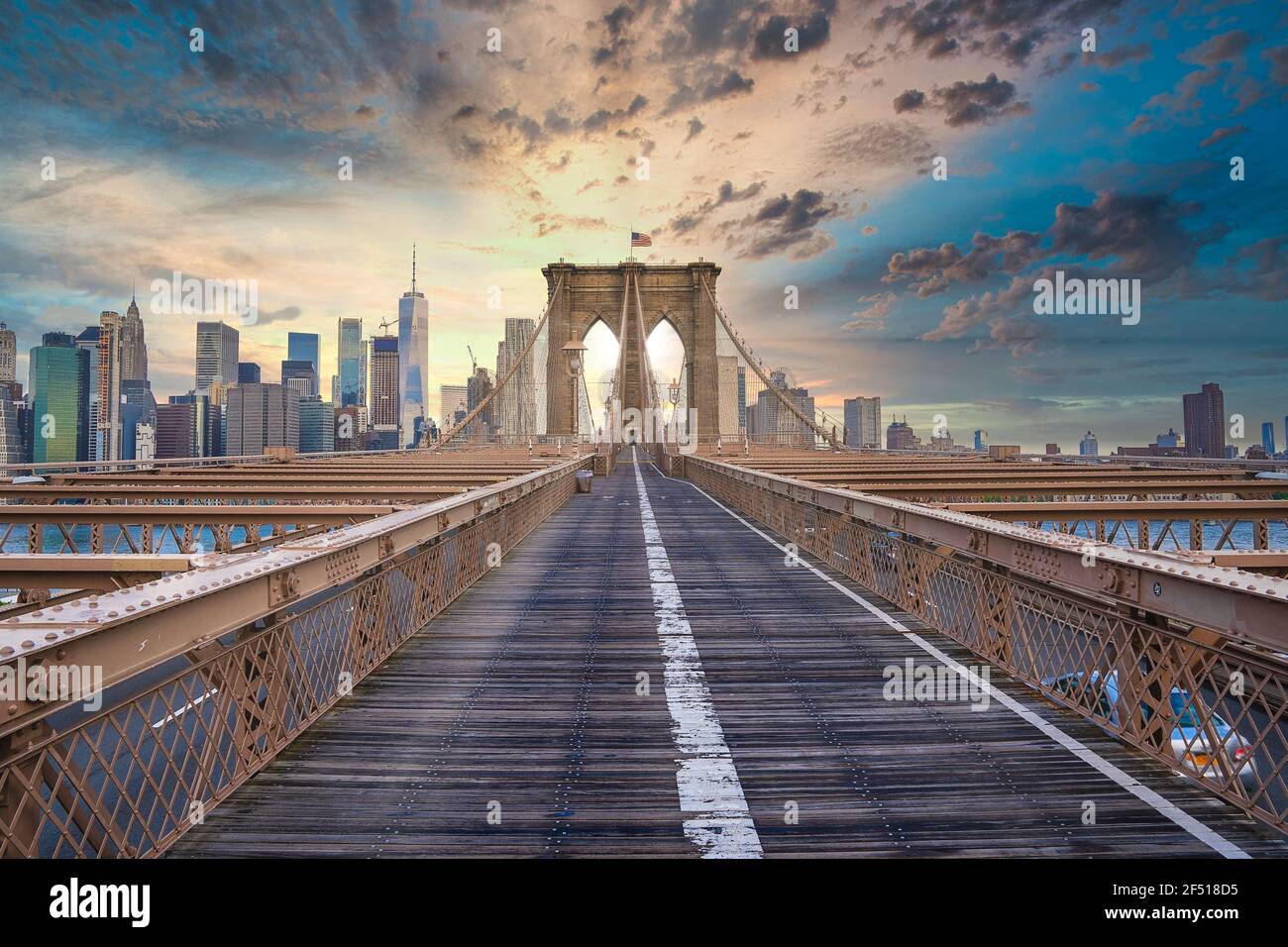 Magical sunset view of the Brooklyn Bridge. Empty bridge with no people ...