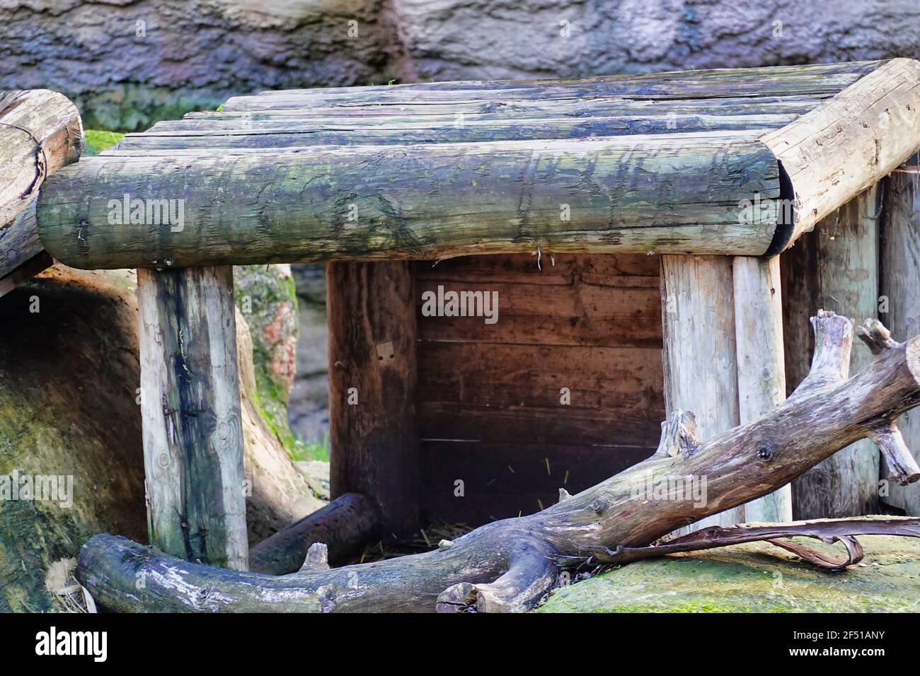 Shot of a little wooden structure with a roof made of wood logs Stock ...