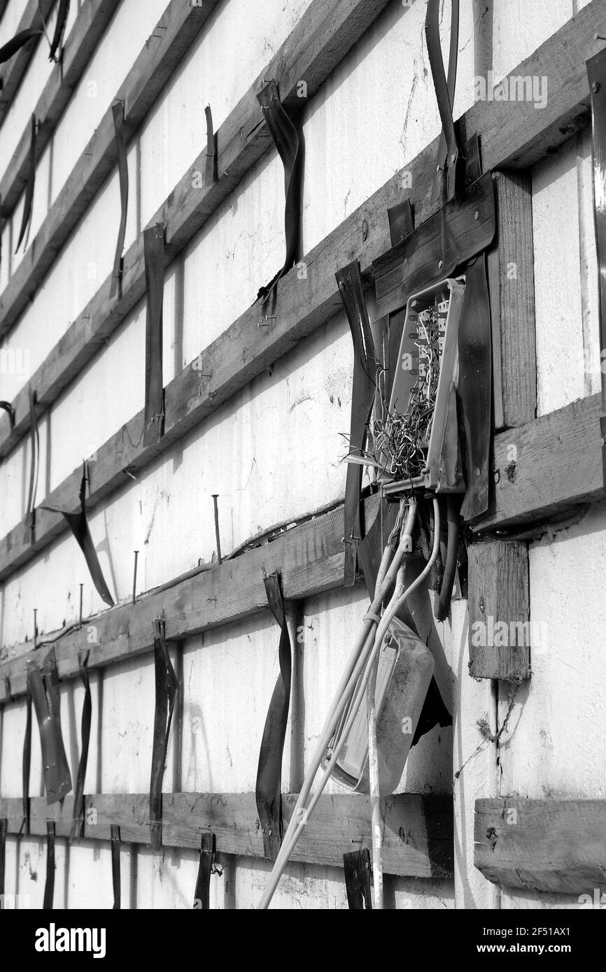 Vertical black and white shot of destroyed cables Stock Photo - Alamy