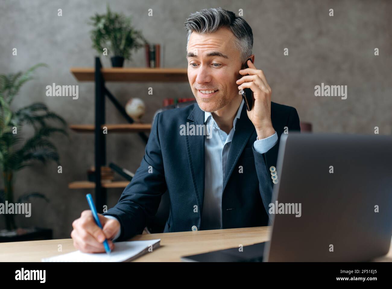 Business leader takes phone hi-res stock photography and images - Alamy
