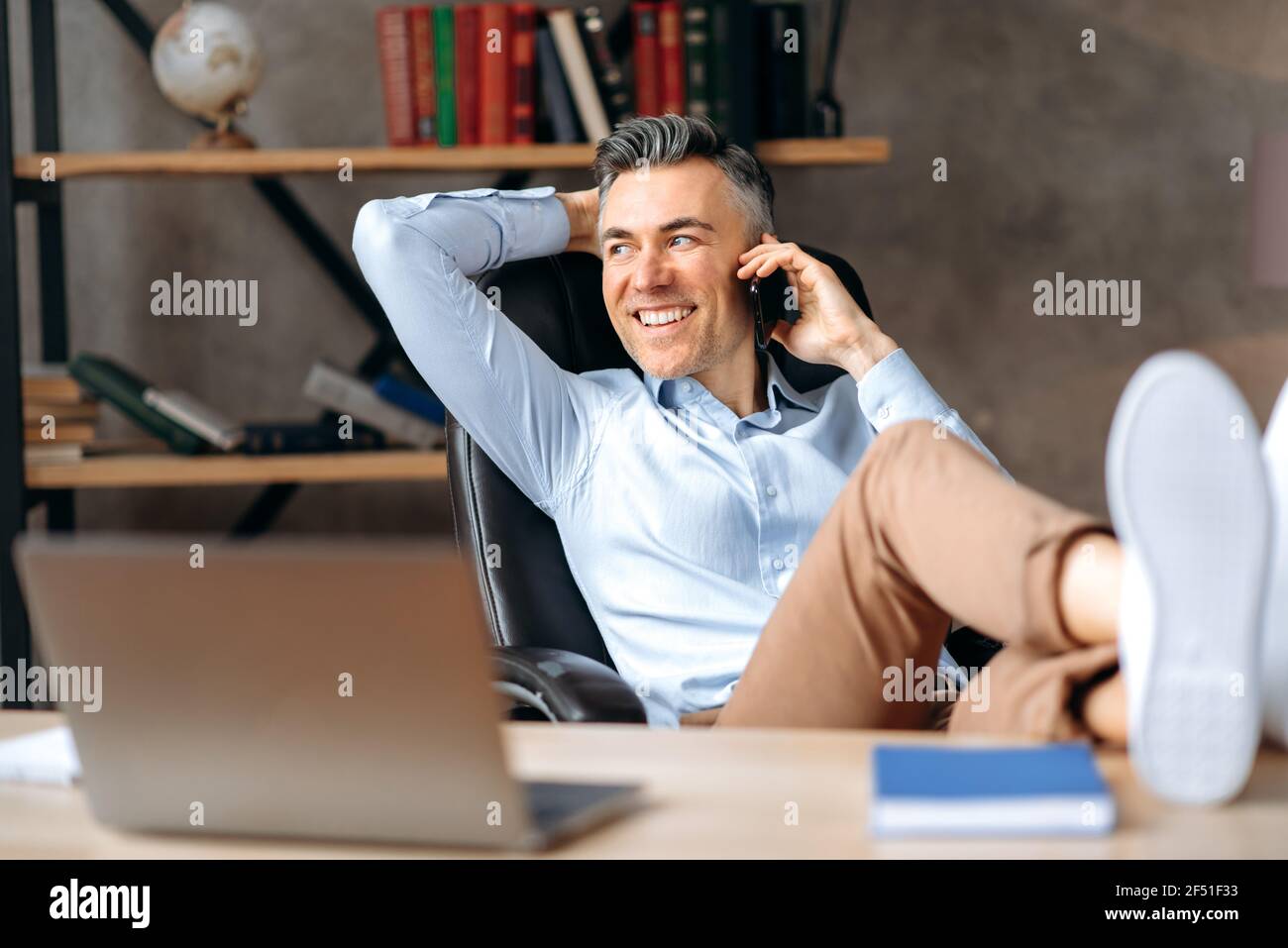 Boss feet on table hi-res stock photography and images - Alamy