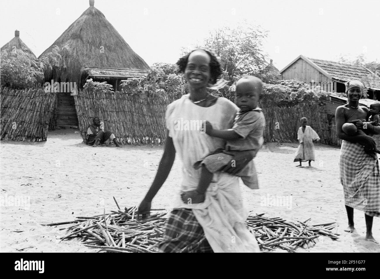 Travel photos Senegal. Huts of the village and locals. View with young ...