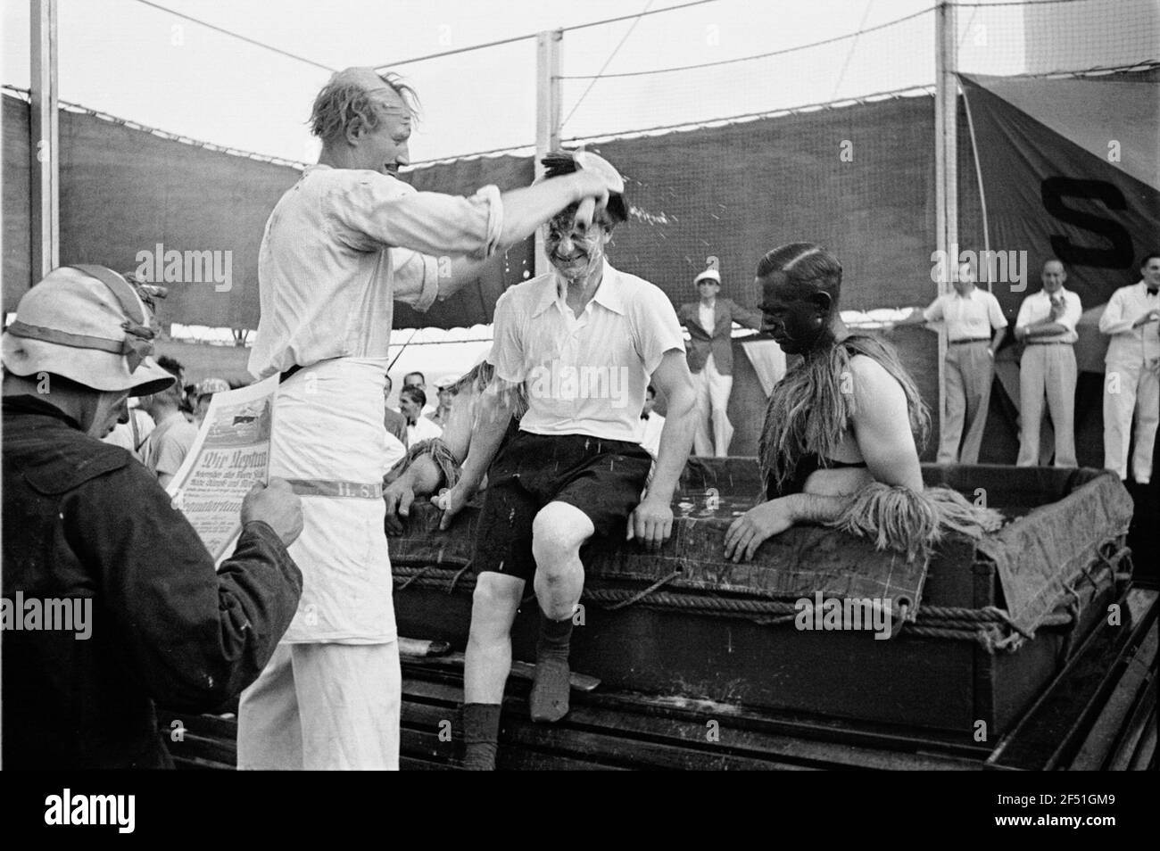 Bordleben Cap Arcona. H.S.D.G. Equator baptism on the passenger ship ...