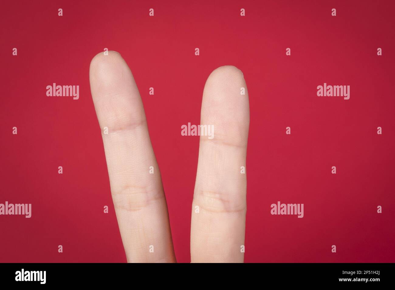 Person doing a peace sign hi-res stock photography and images - Alamy