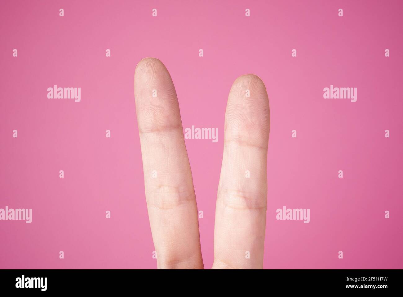 Person doing a peace sign hi-res stock photography and images - Alamy