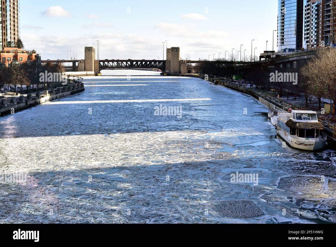 Chicago, Illinois, USA. Ice clogs the Chicago River in downtown Chicago ...