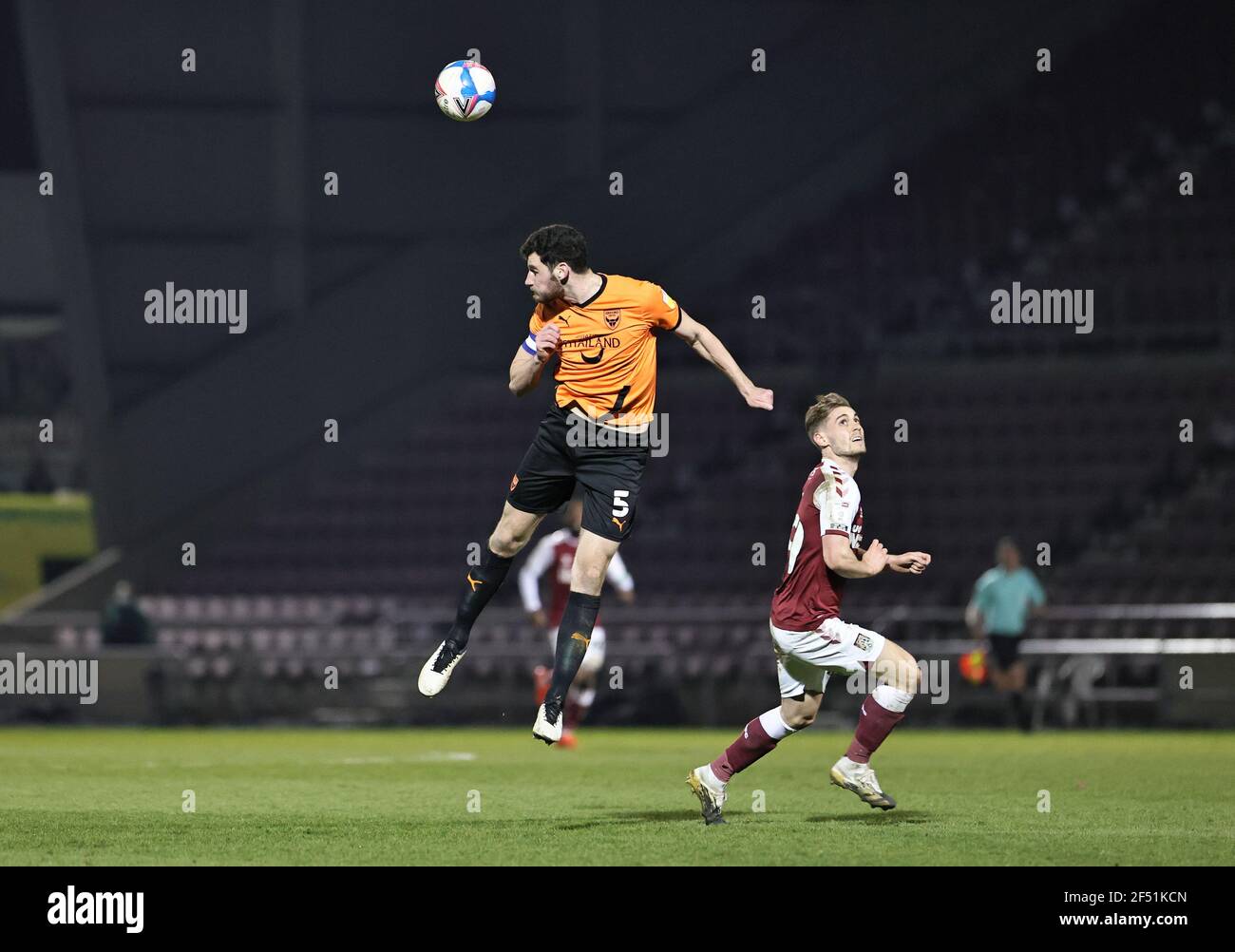 NORTHAMPTON, ENGLAND. MARCH 23RD: Elliot Moore of Oxford United heads ...