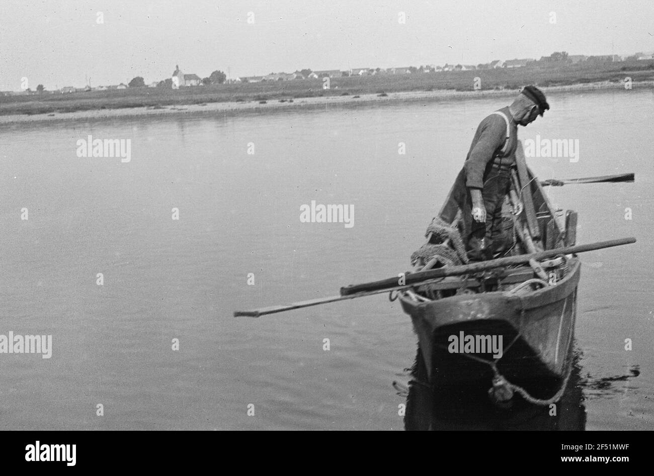 View fisherman in fish Black and White Stock Photos & Images - Alamy