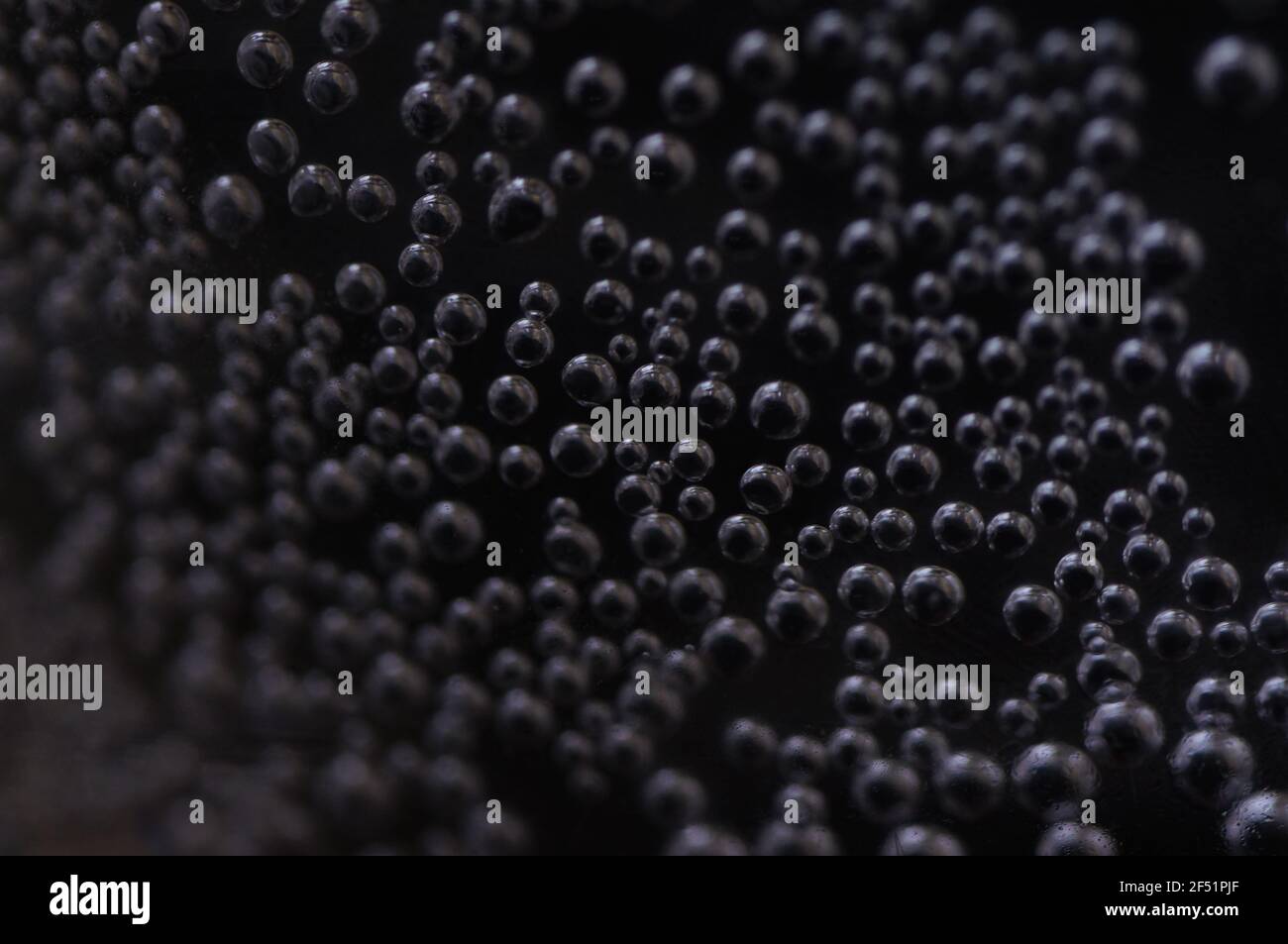 Close-up of gas bubbles in water. Soda water on close-up. Carbonated ...