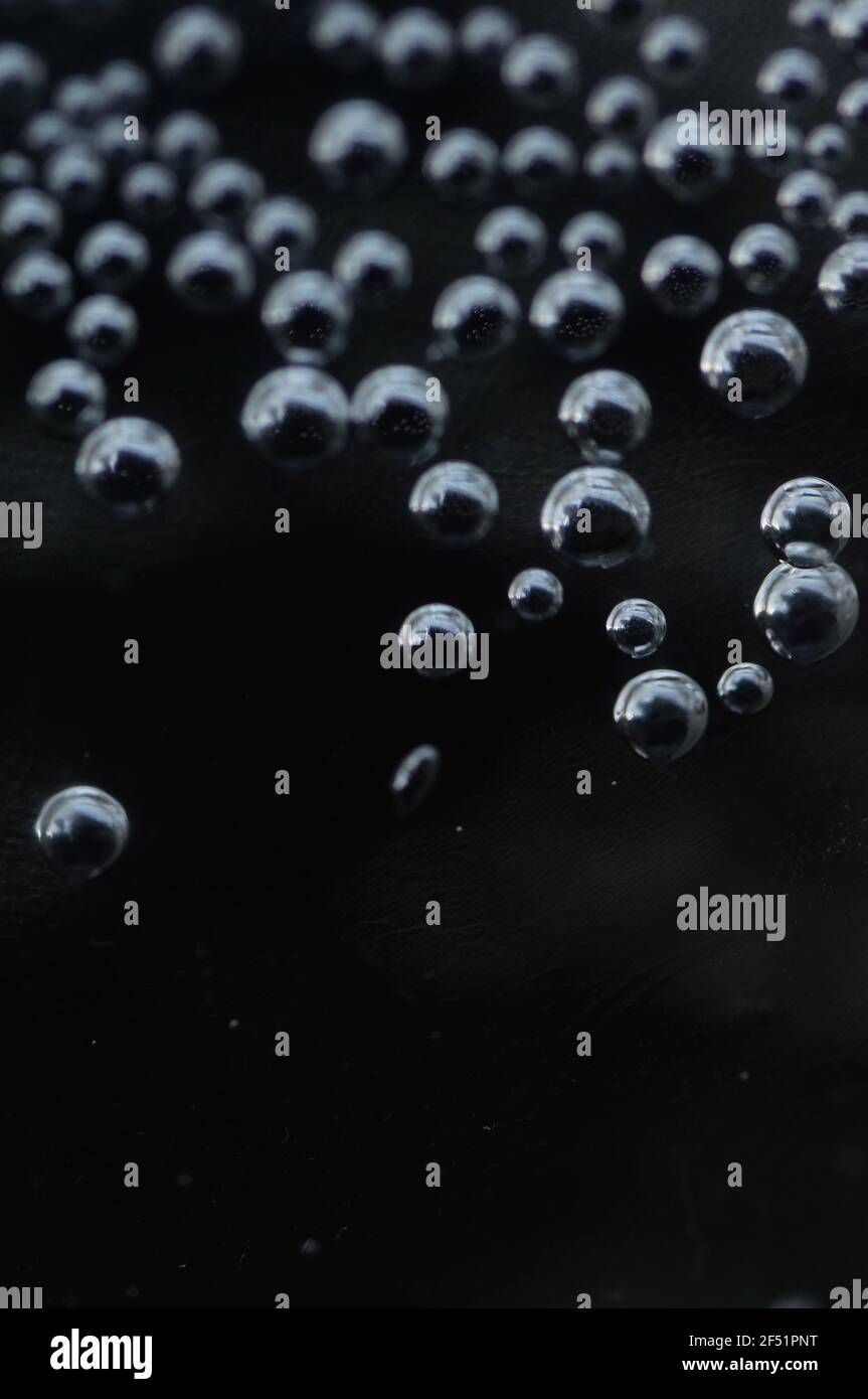 Close-up of gas bubbles in water. Soda water on close-up. Carbonated ...