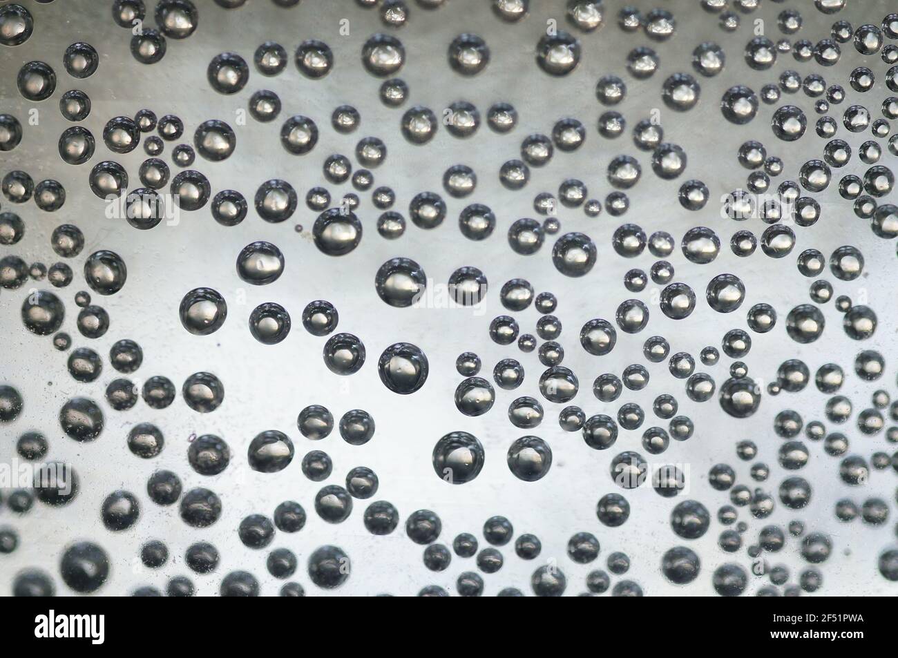 Close-up of gas bubbles in water. Soda water on close-up. Carbonated ...
