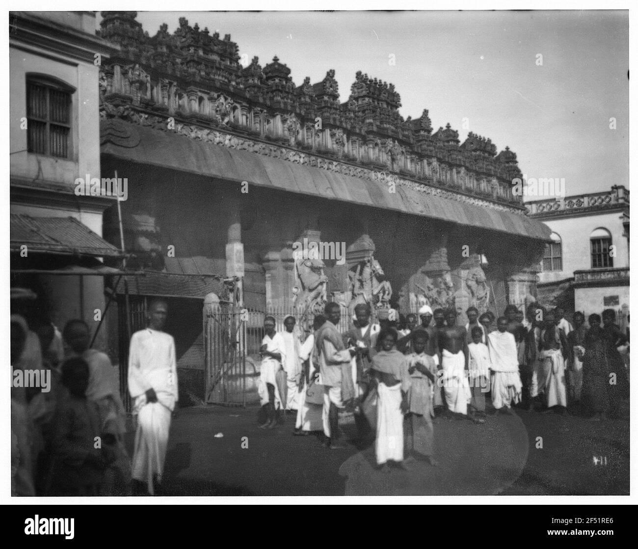 People group in front of a temple Stock Photo - Alamy