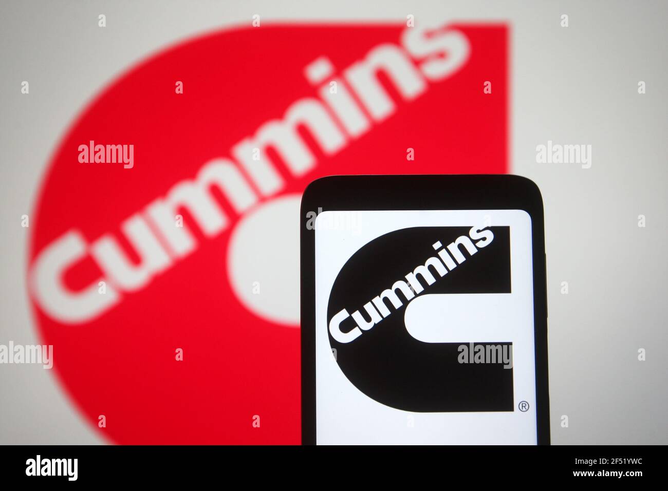 In this photo illustration, Cummins logo is seen displayed on a ...