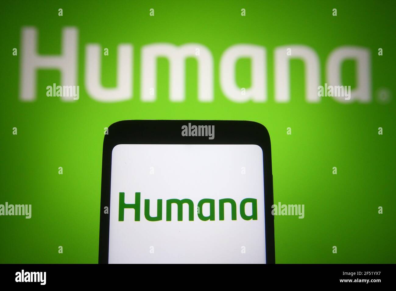 In this photo illustration, Humana logo is seen displayed on a ...