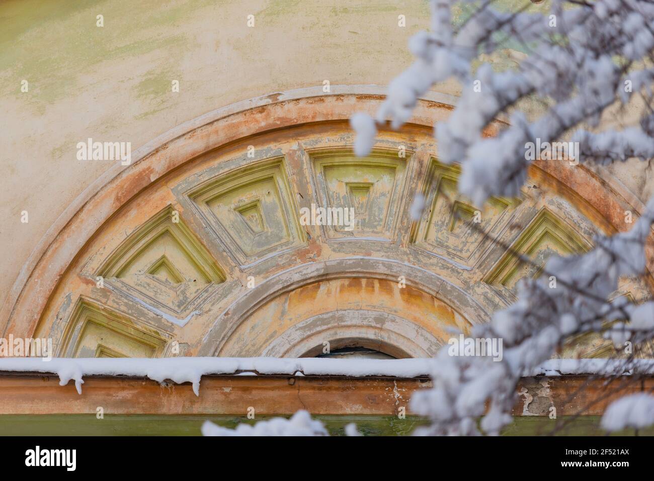 Dormer window with bas-relief. Old house in the center of Magnitogorsk ...