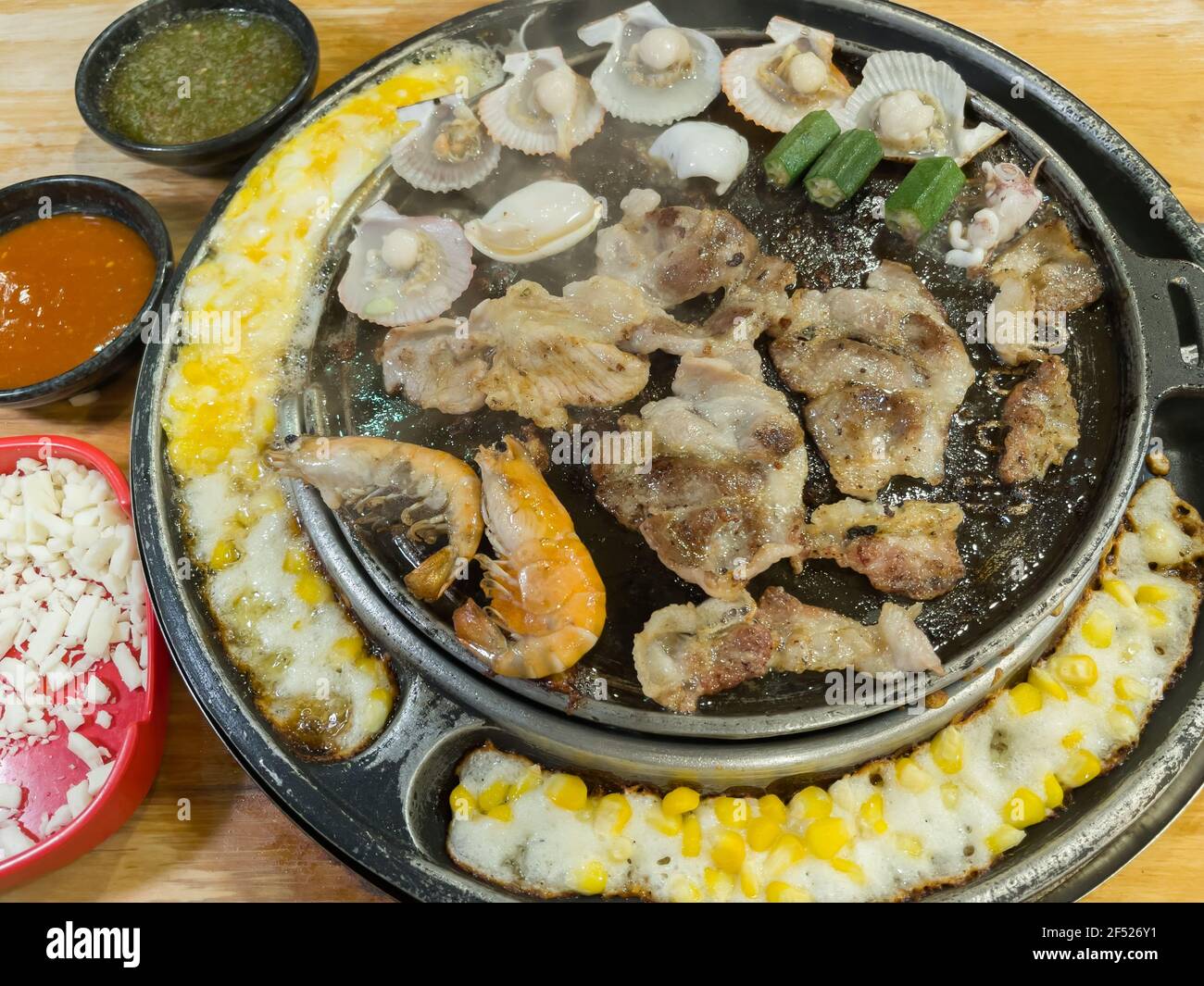 Set of korean grill buffet in the restaurant, pork and seafood Stock ...
