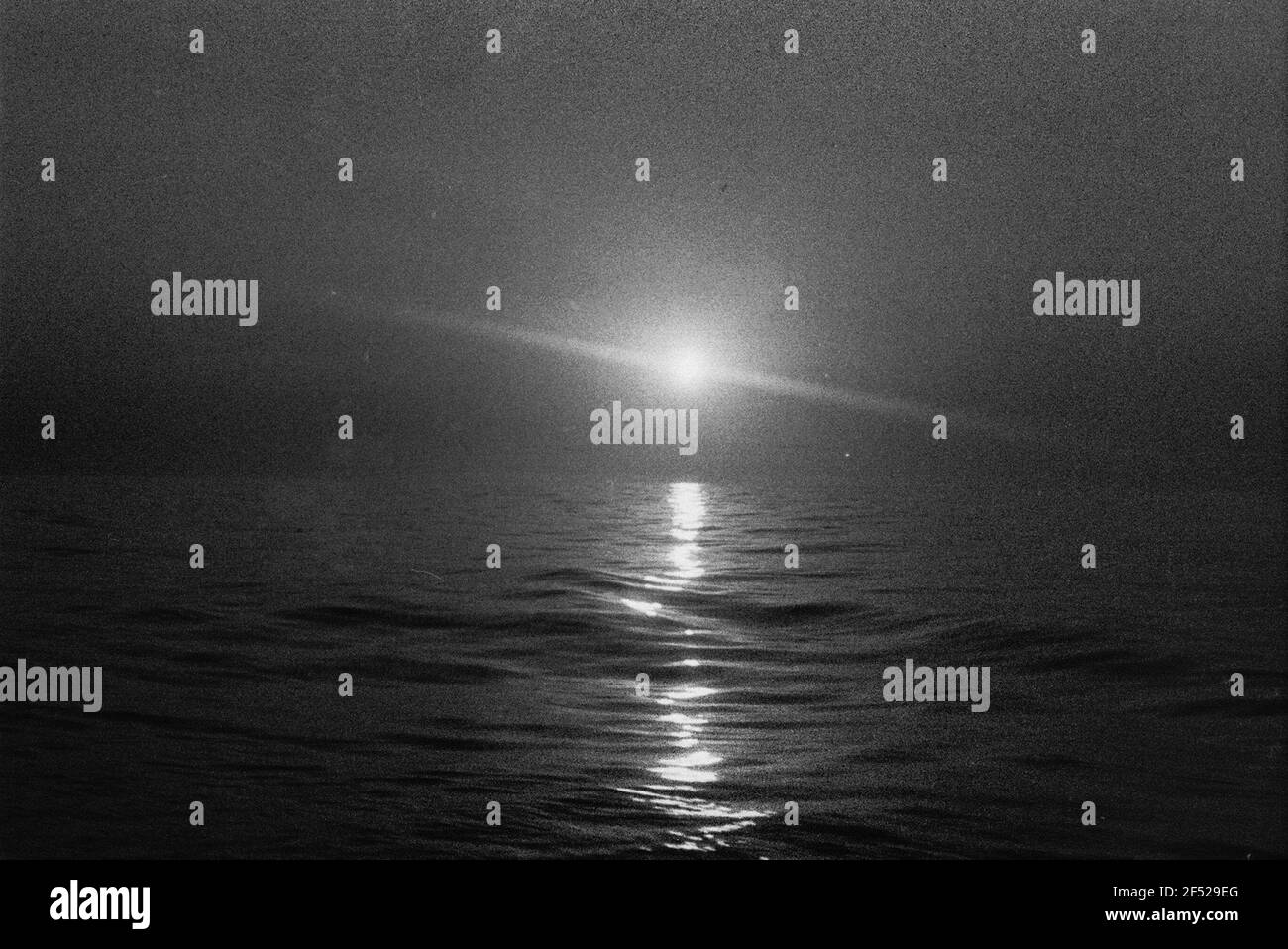 Travel photos. Moonlight? above the sea Stock Photo - Alamy
