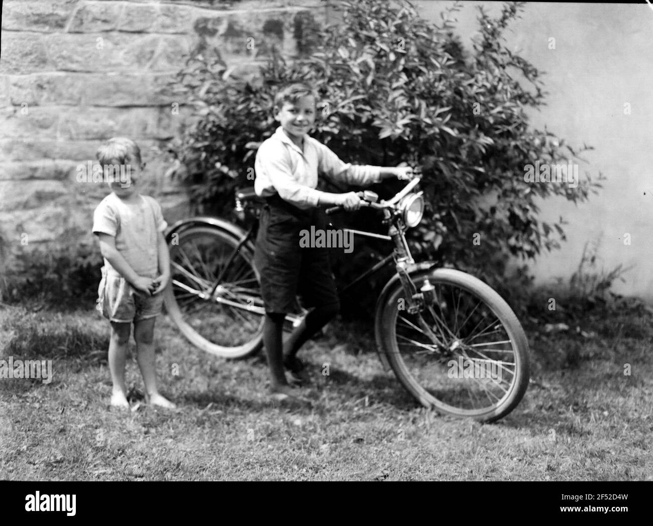 Werner Krauze and boy with bicycle Stock Photo - Alamy