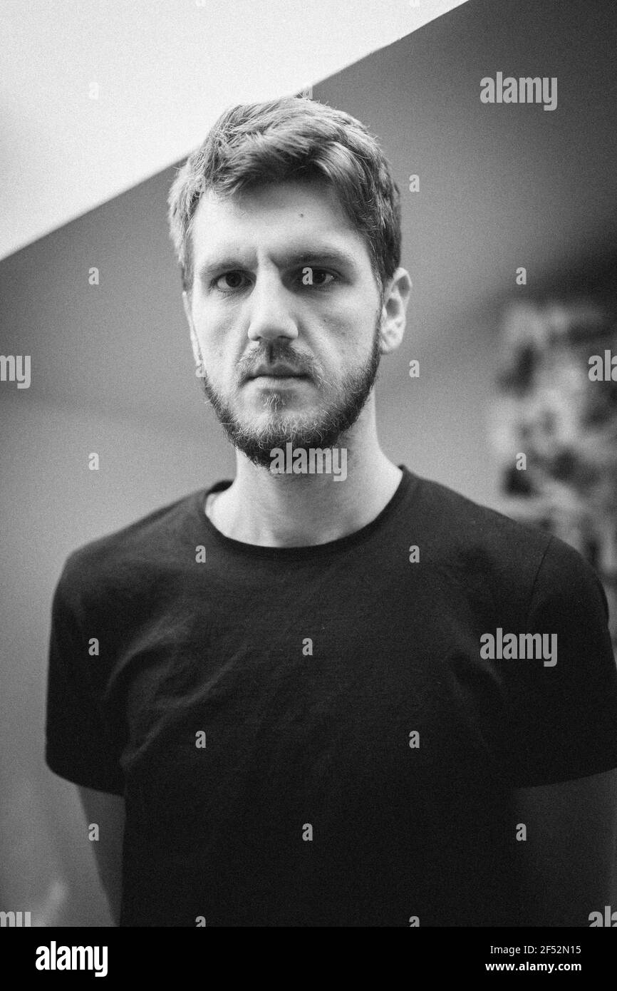 Shallow focus shot of a Bosnian Caucasian man looking at the camera ...