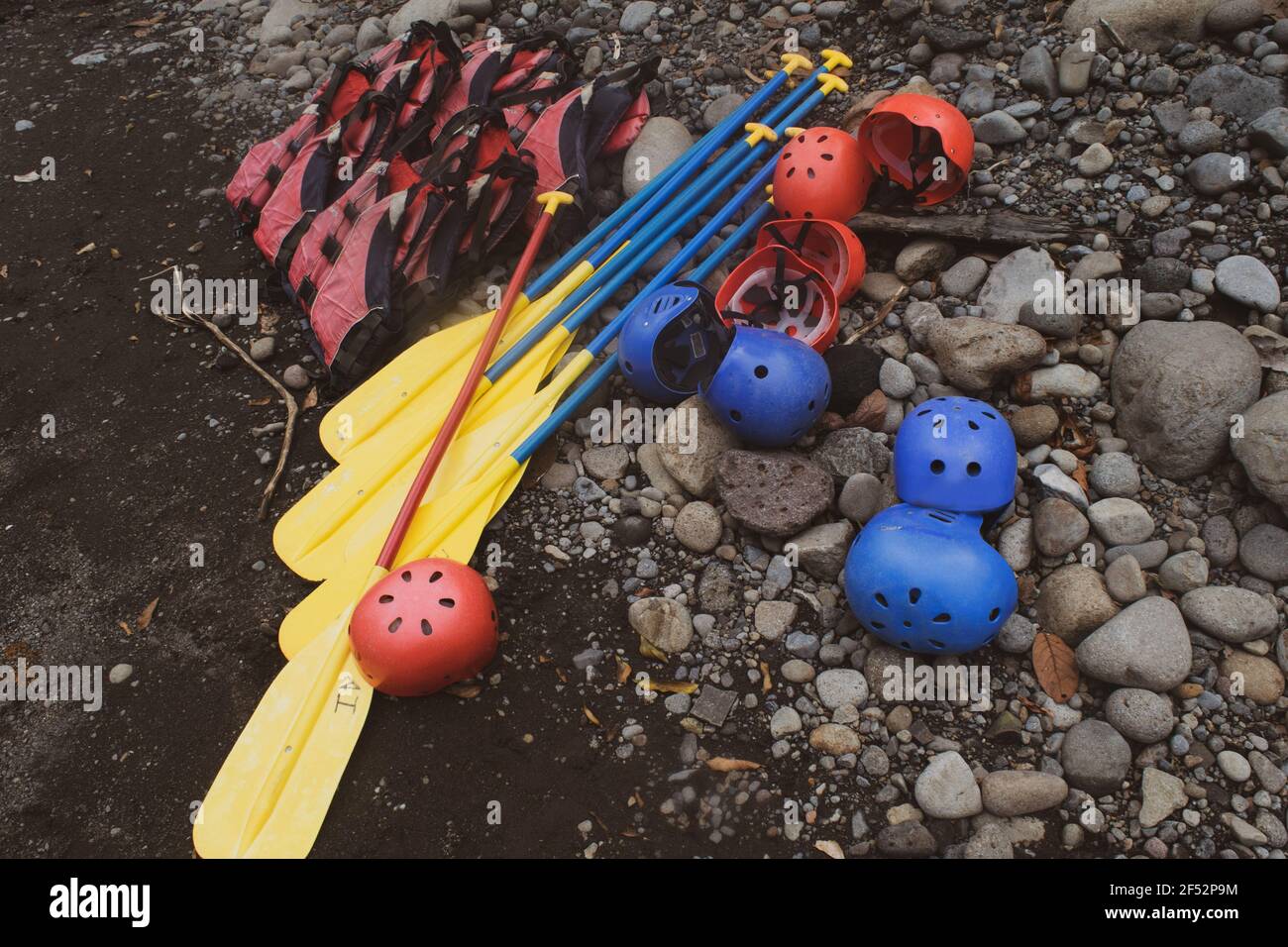 Rafting gear on rocks by the river, Costa Rica Stock Photo - Alamy