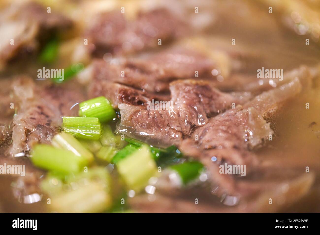 A delicious Chinese dish, yuba sirloin in clear soup pot Stock Photo ...