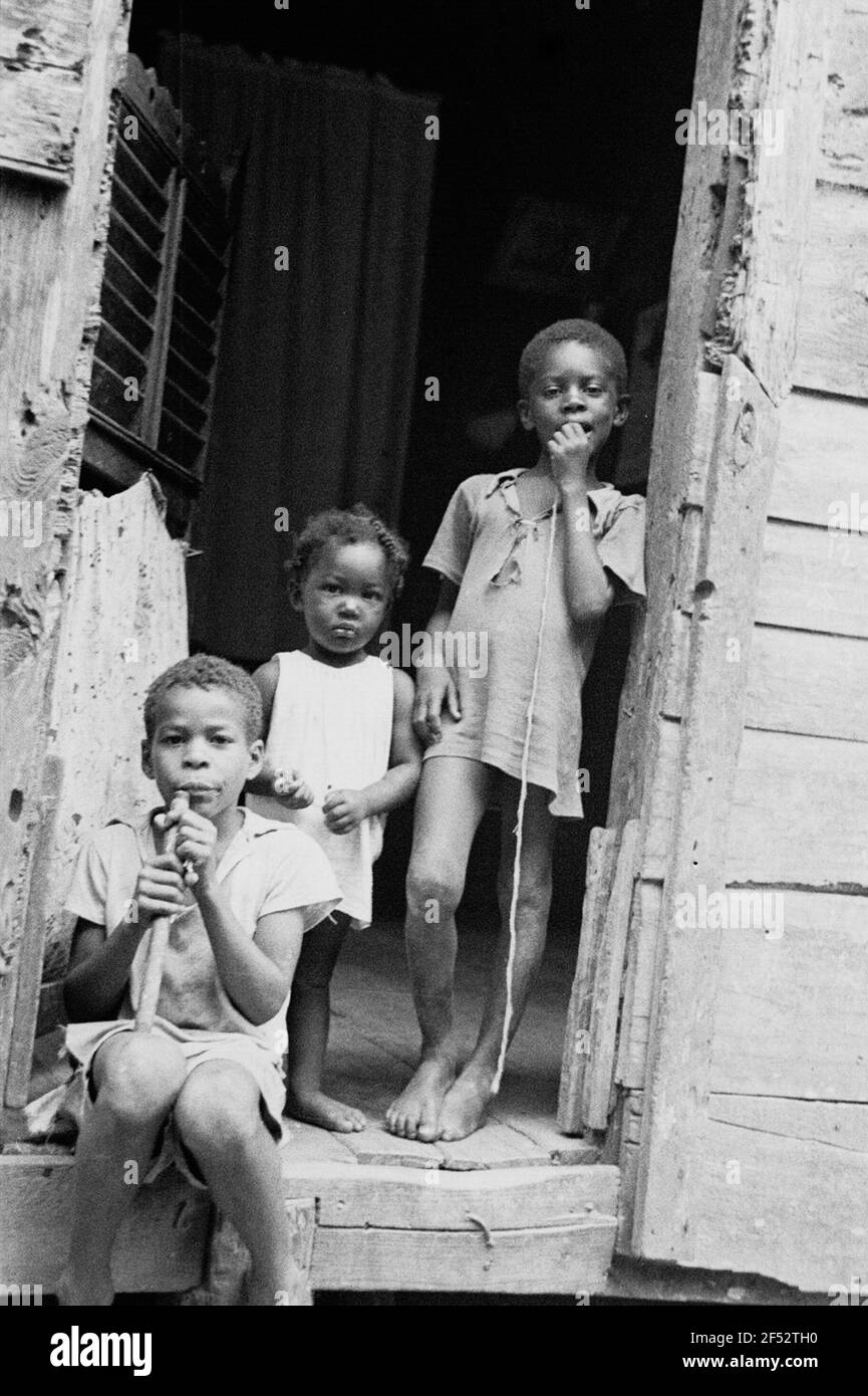 Travel Photos Caribbean. Trinidad. Three children in a front door Stock ...