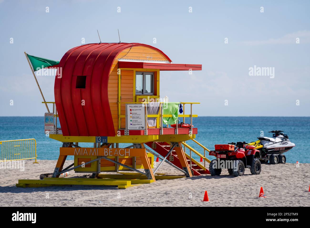 Orange lifeguard toewr Miami Beach FL with green flag safe swimming ...