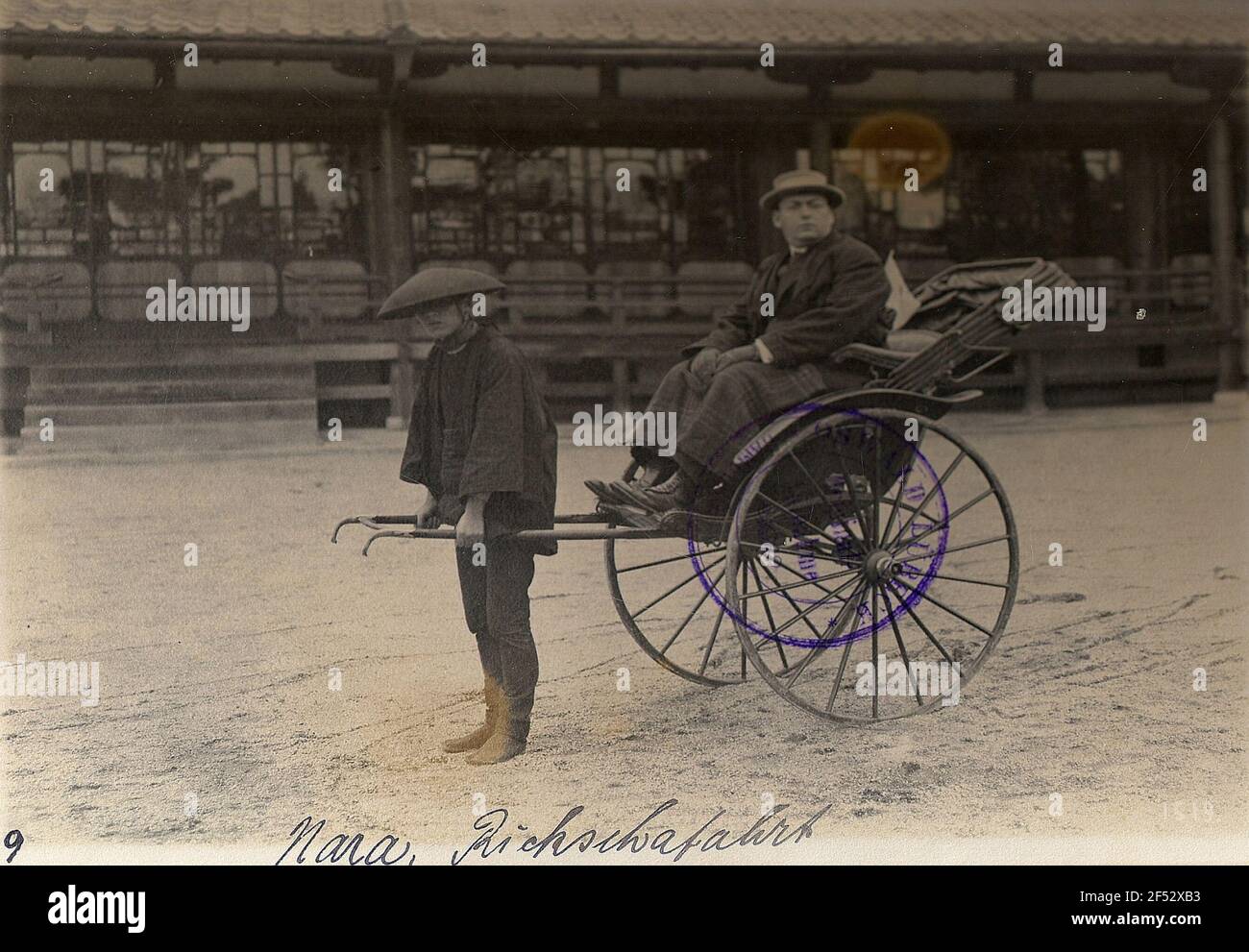 Portrait of a gentleman in rickshaw with native driver before a temple ...