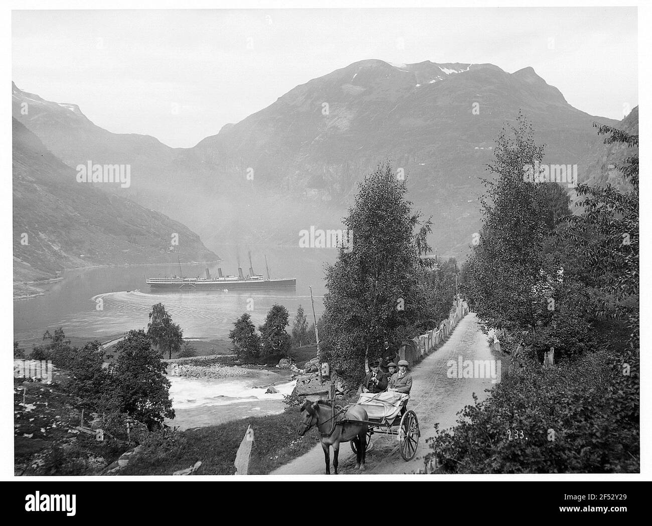 Merok / Norway: View in Geirangerfjord with Victoria Luise in the bay ...