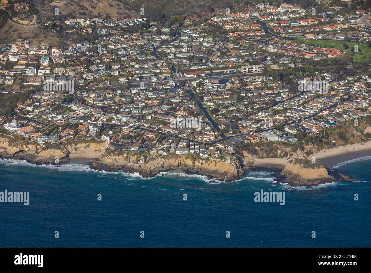 Afternoon aerial view of the Orange County coastal city of Laguna Beach ...