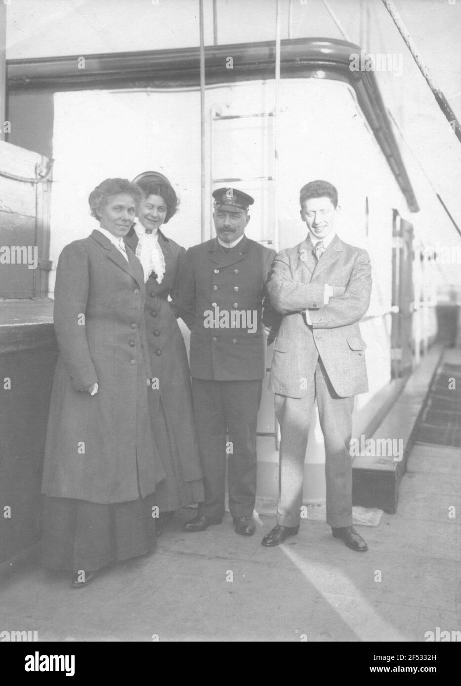 Group formation with tourists and captain aboard a passenger steamer ...