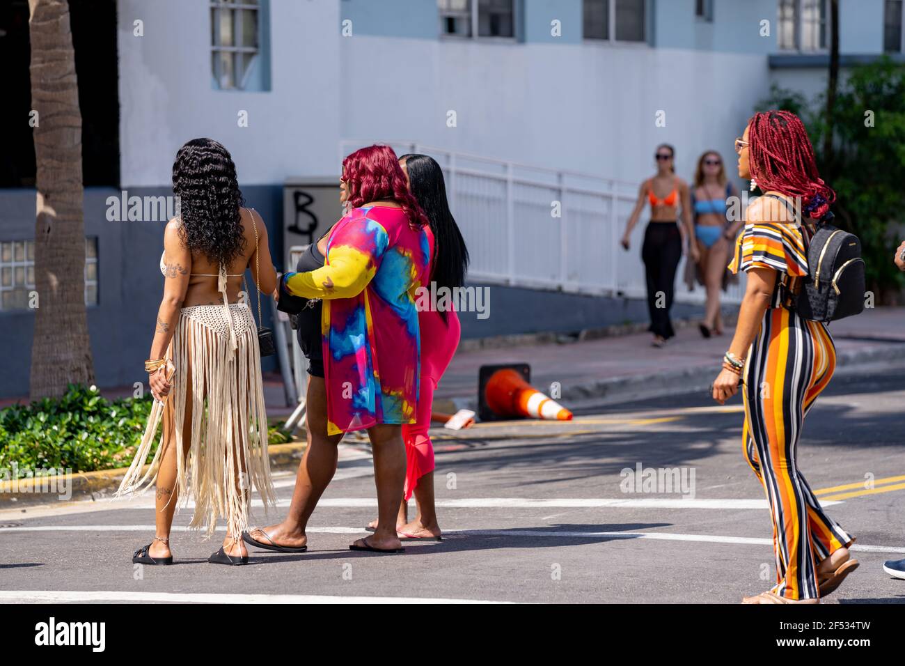 Women dressed in colorful clothing Miami Beach Spring Break 2021 Stock ...
