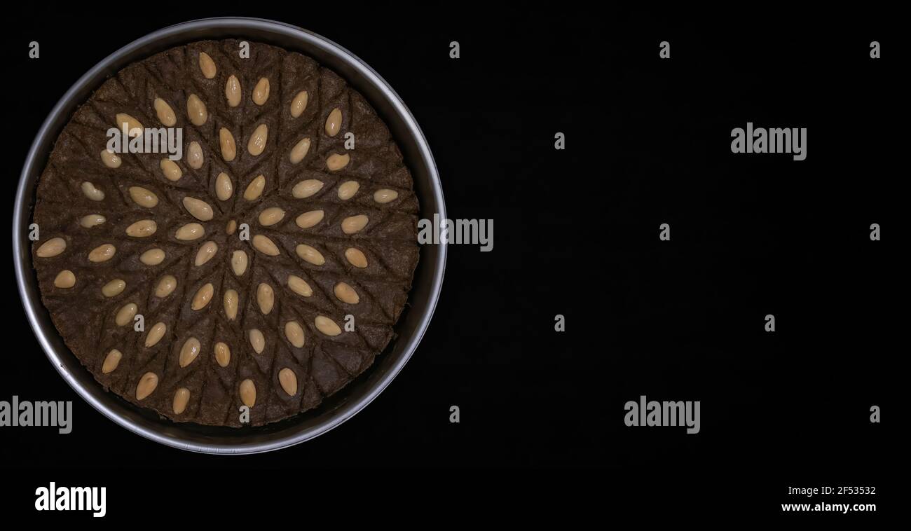 Arabic breaded groats dish called in Arabic Kebba on a black background ...