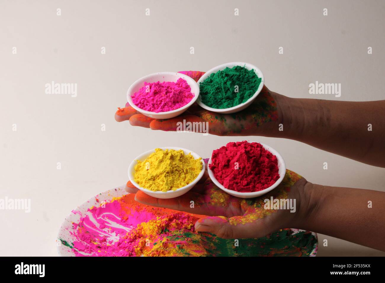 holi greetings view of hands with gulal for Hindu spring festival of ...