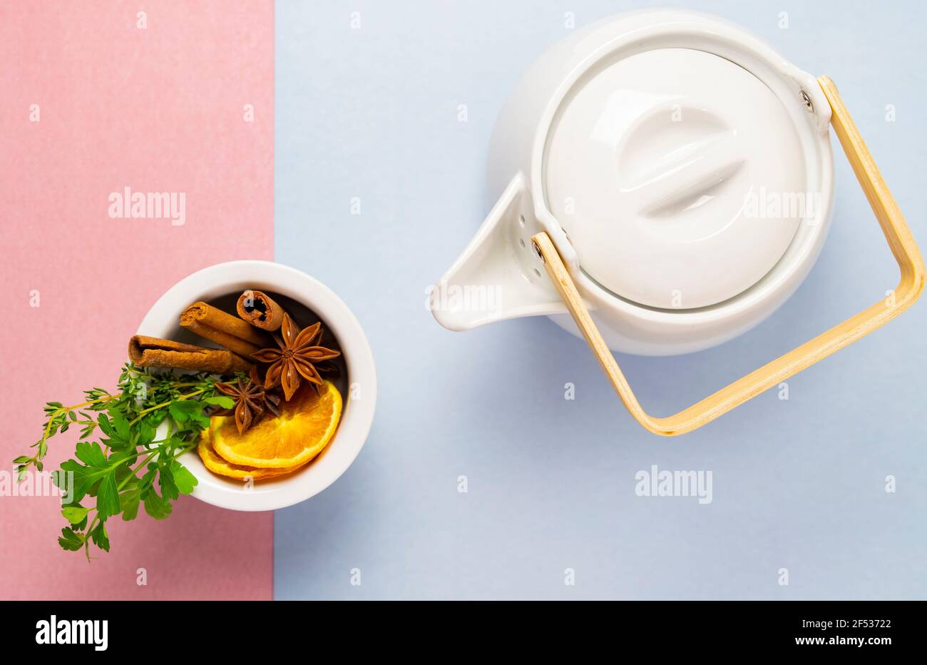 Herbal tea on pascal color background rose and blue - thymian cinnamon ...