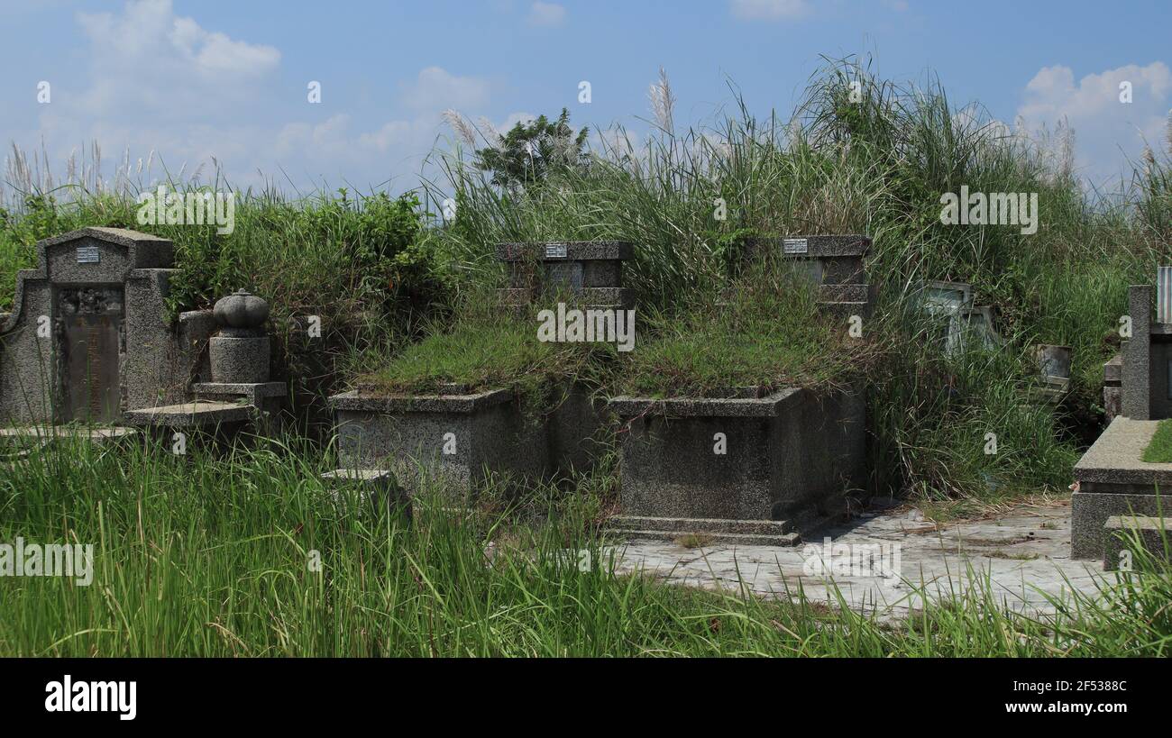 Chinese culture traditional concrete tombs with Chinese memorial name ...