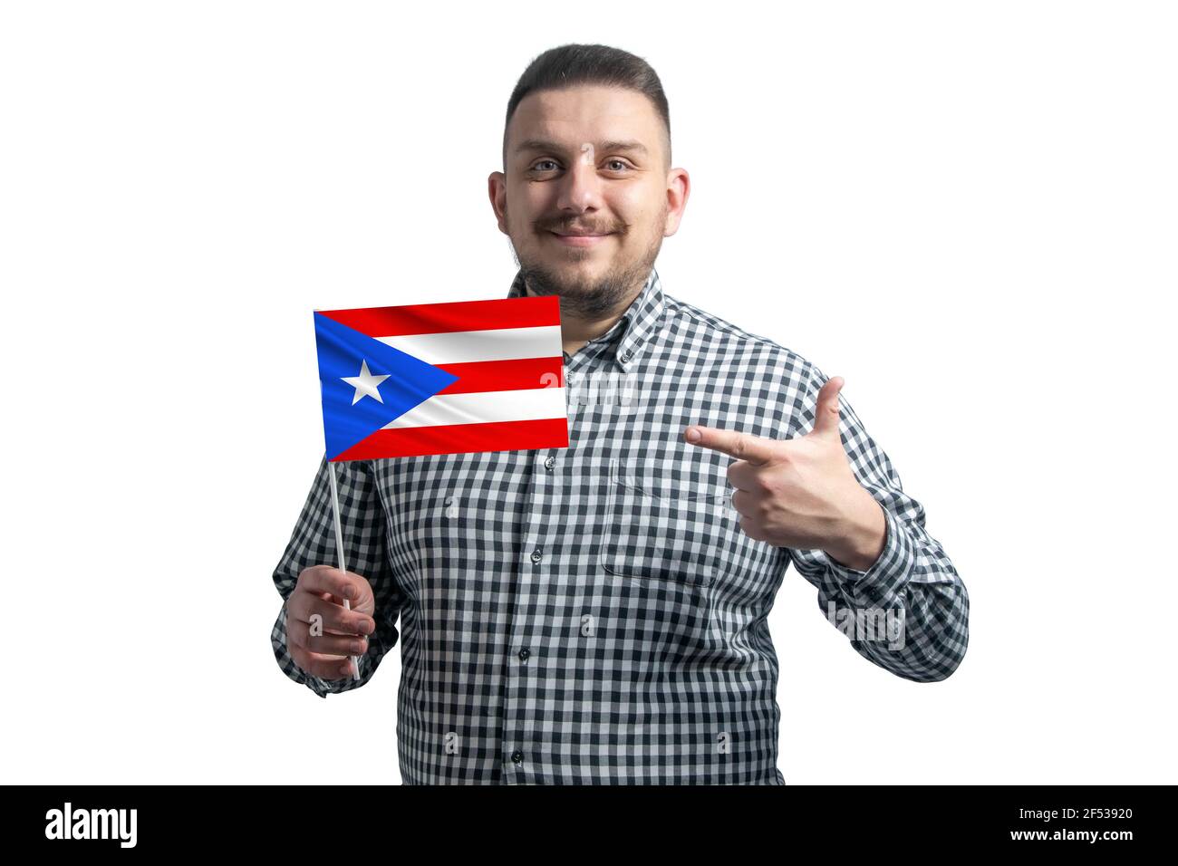 White guy holding a flag of Puerto Rico and points the finger of the ...