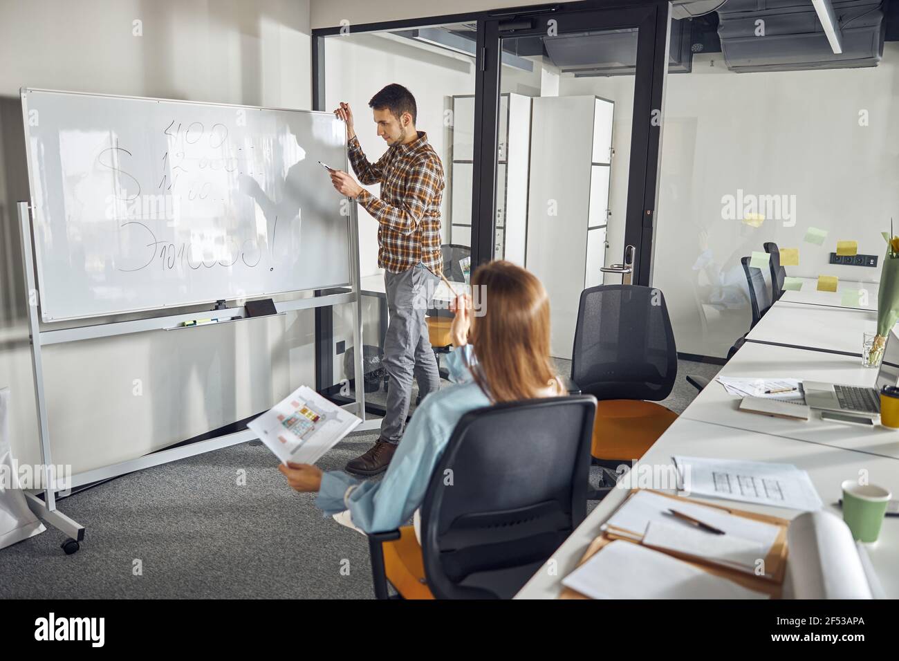 Architects working at a new building project in the office Stock Photo ...