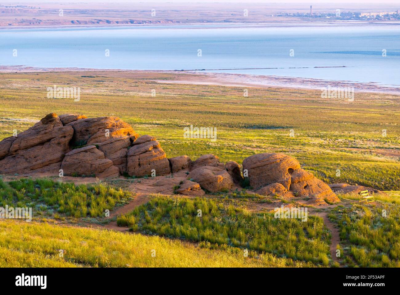 View of the salty lake Baskunchak. A stone similar to the head of an ...