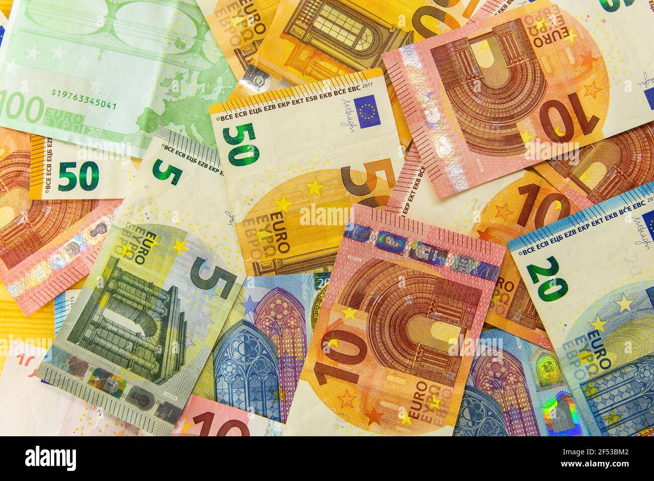 Pile of euro banknotes as background. Money concept Stock Photo - Alamy